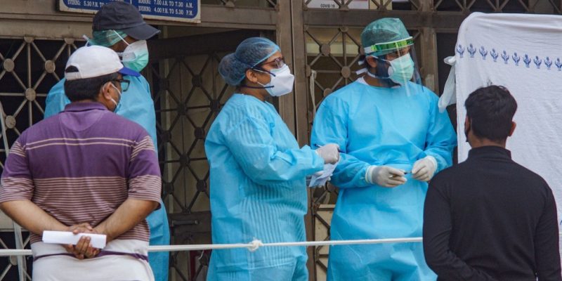 Low Wages, Poor PPE: Contractual Healthcare Workers Face the Worst of ...